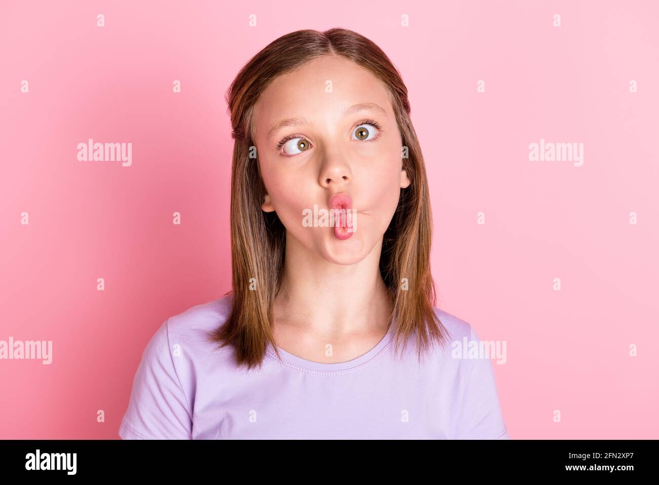 Photo of funky small positive girl make funny face careless good mood ...