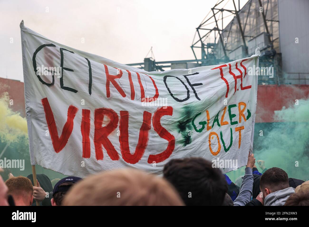 Fans protest with sign outside Old Trafford in, on 5/13/2021. (Photo by ...