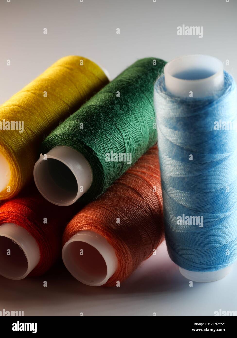 Vertical shot threads sewing hi-res stock photography and images - Alamy