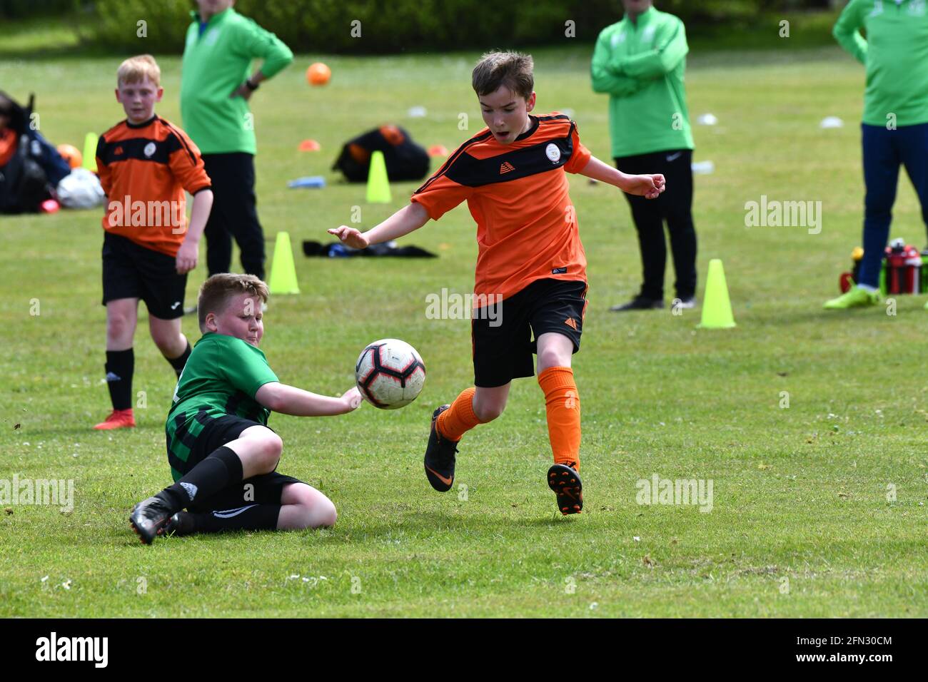 Boys junior football match action Britain Uk Stock Photo - Alamy