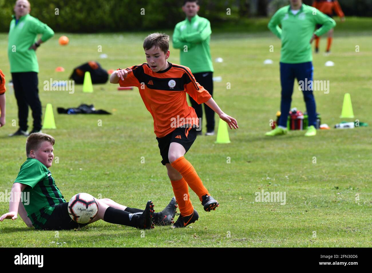 Boys junior football match action Britain Uk Stock Photo - Alamy