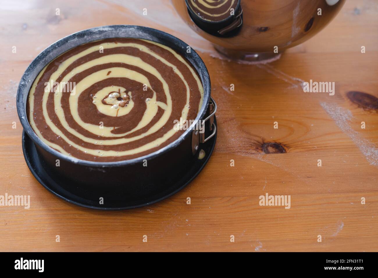 Marble sponge cake elaboration process. Copy space. Pastry Stock Photo ...