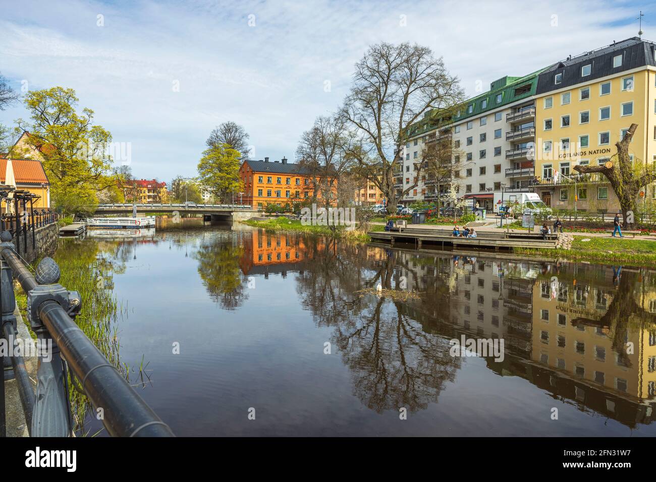 Beautiful city landscape view of colorful buildings along river side ...