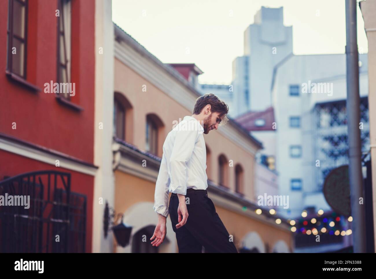 Attractive young male model in city Stock Photo - Alamy