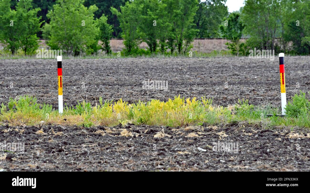 Petroleum pipeline crossing warning signs indicating where underground ...