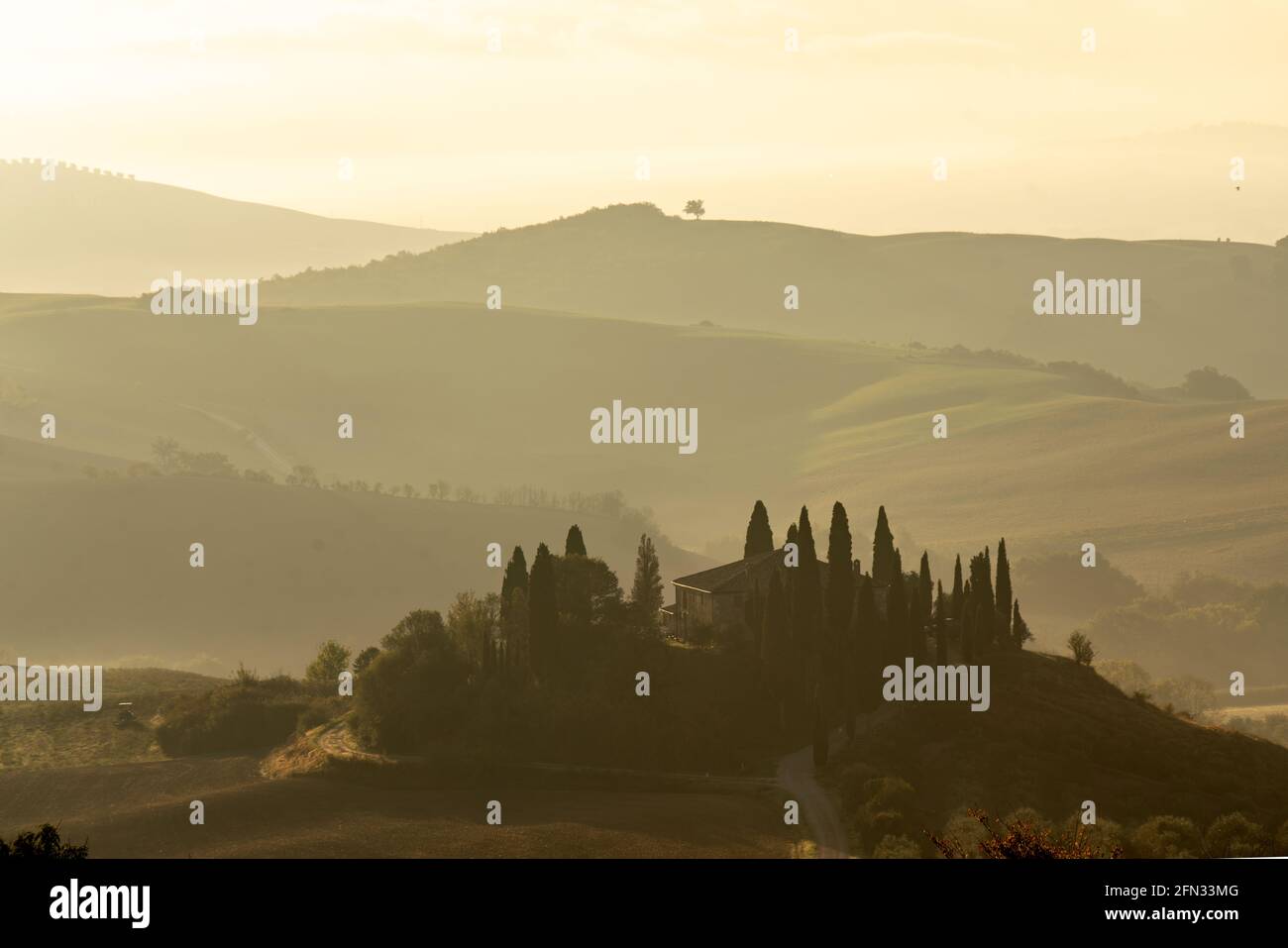 The Tuscan countryside, an Italian landscape on an early autumn morning ...