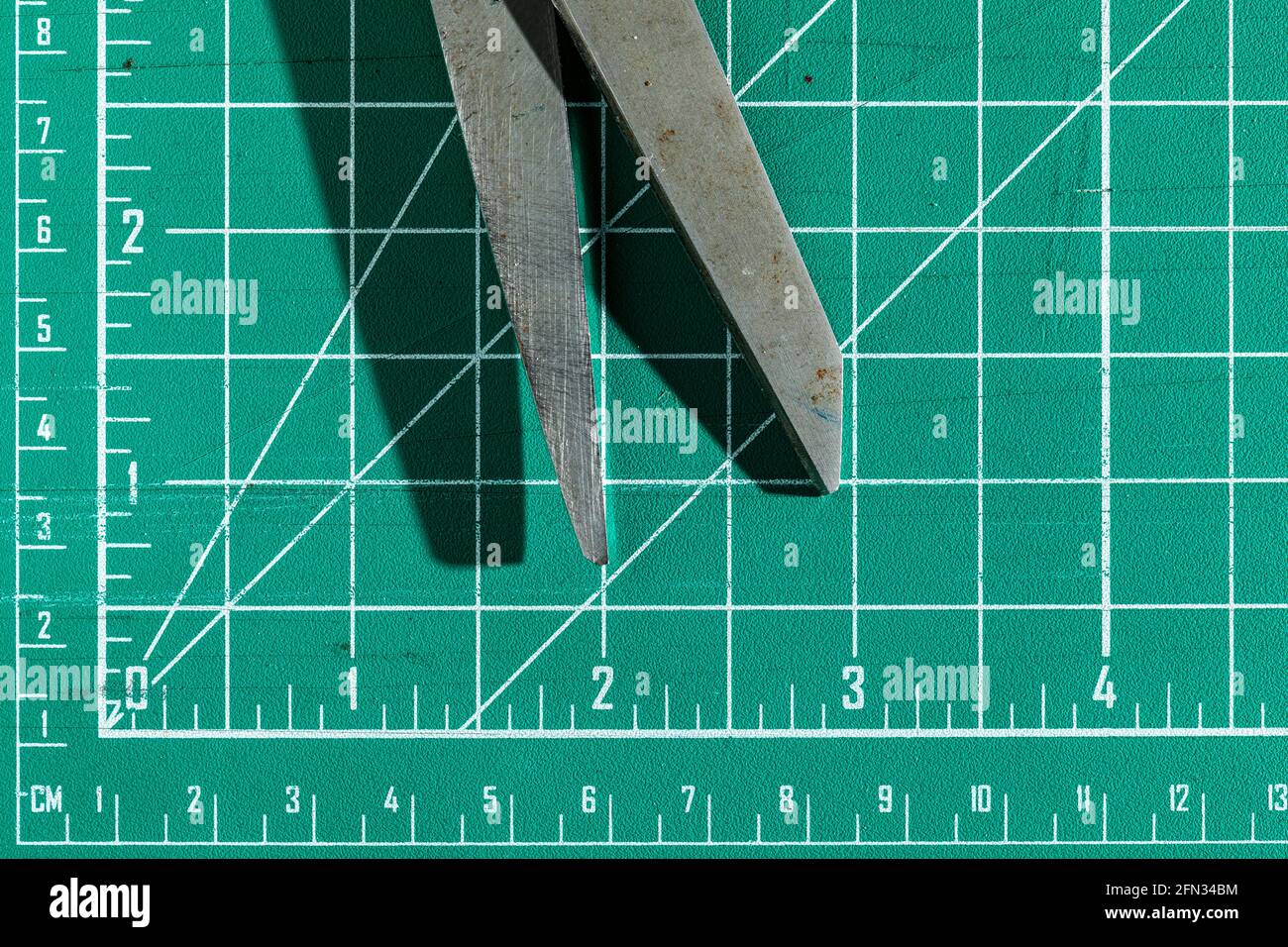 Used Green cutting mat with scissors, plenty of copy room all around ...