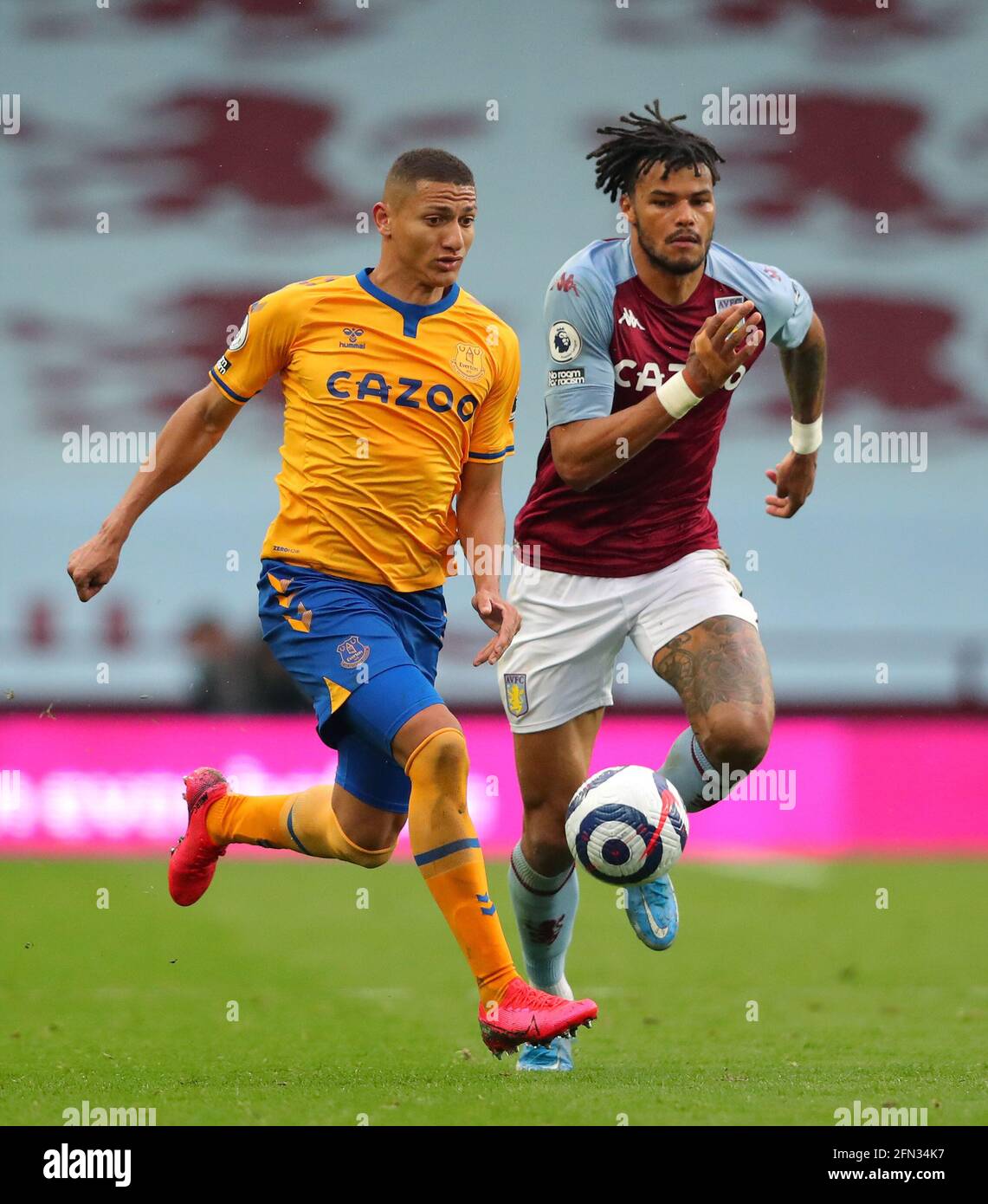 Everton's Richarlison (left) and Aston Villa's Tyrone Mings battle for ...