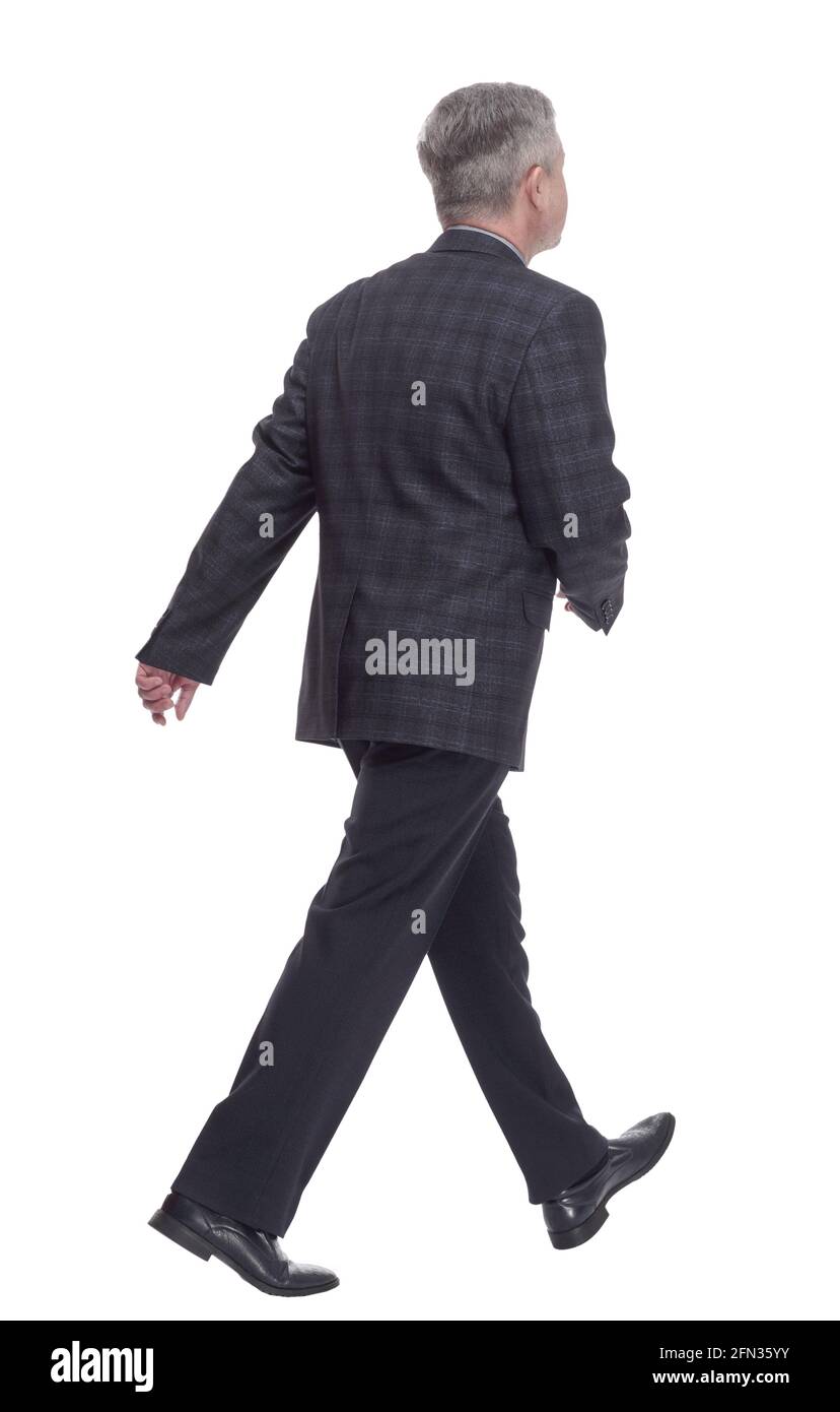 confident adult male striding forward . isolated on a white Stock Photo ...