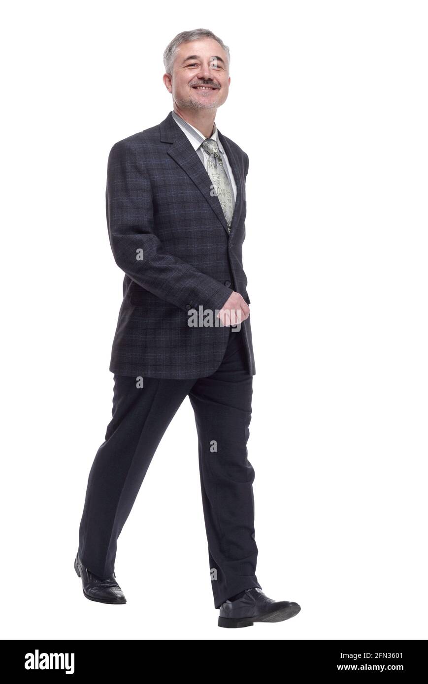 confident adult male striding forward . isolated on a white Stock Photo ...