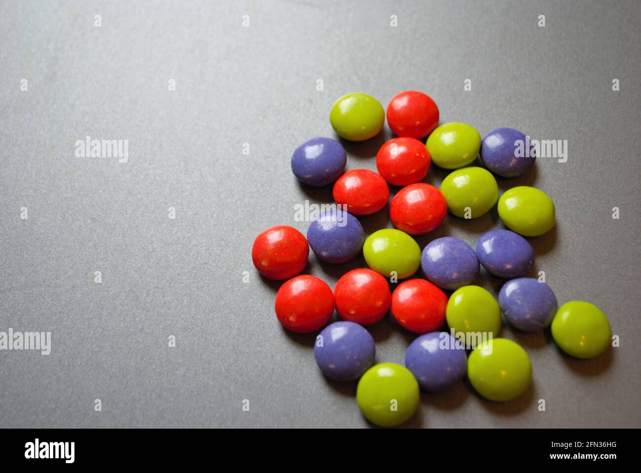 Colorful Halloween candy background orange blue green purple candy ...