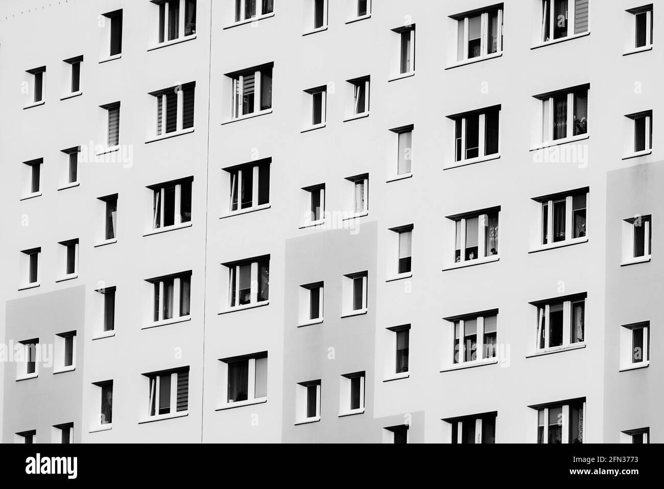 Windows in the block of flats. Urban view. Conceptual image, parallel ...