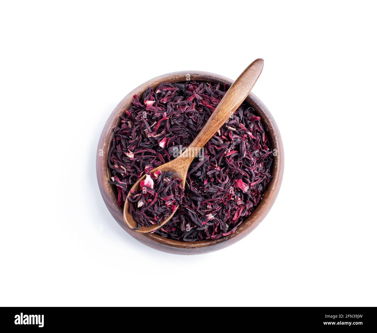 Dried red hibiscus tea in wooden bowl isolated on white Stock Photo - Alamy