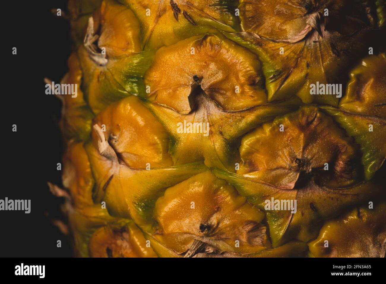 Macro close up portrait of a Pineapple with black background Stock ...