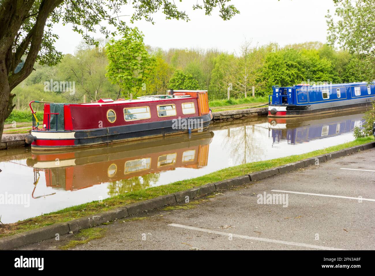 Canal narrowboats moored on the Trent and Mersey canal at Rode Heath in ...