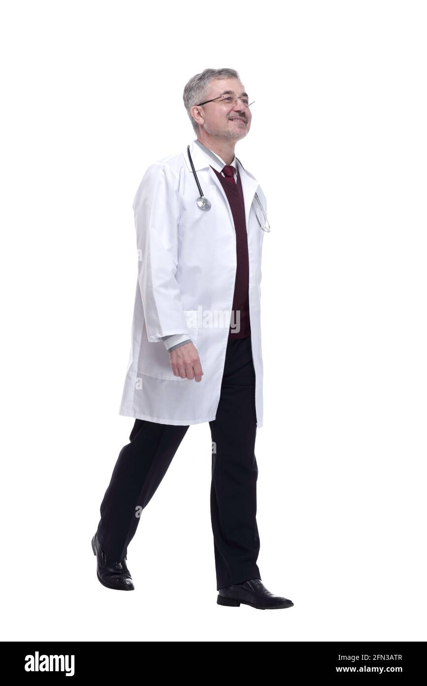 friendly doctor striding towards you. isolated on a white Stock Photo ...