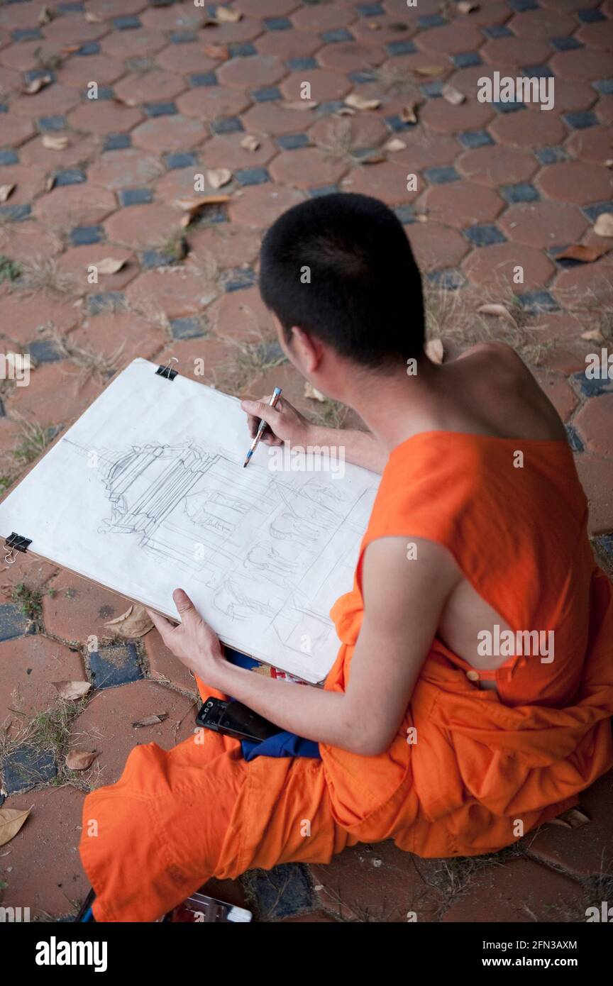 Buddhist monk painting chiang mai hi-res stock photography and images ...