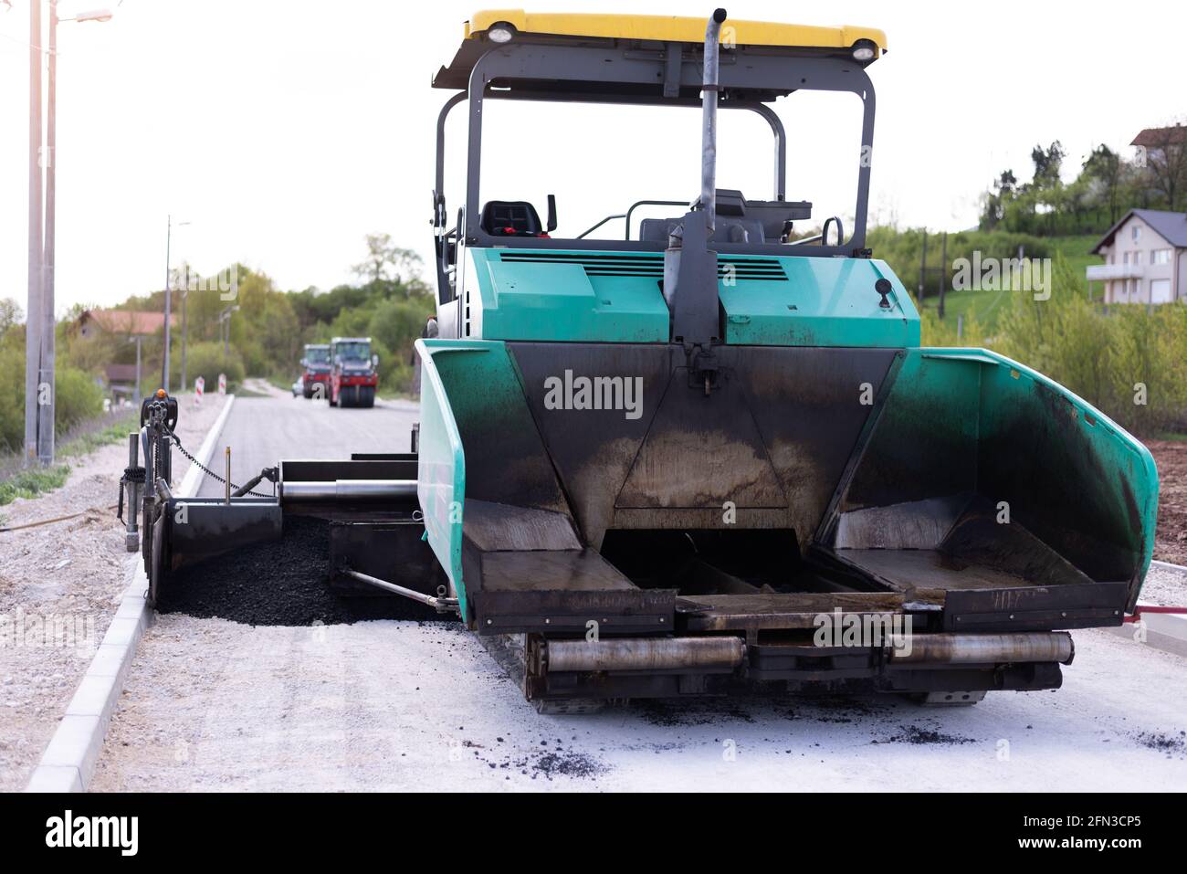 Street resurfacing. Fresh asphalt construction Stock Photo - Alamy