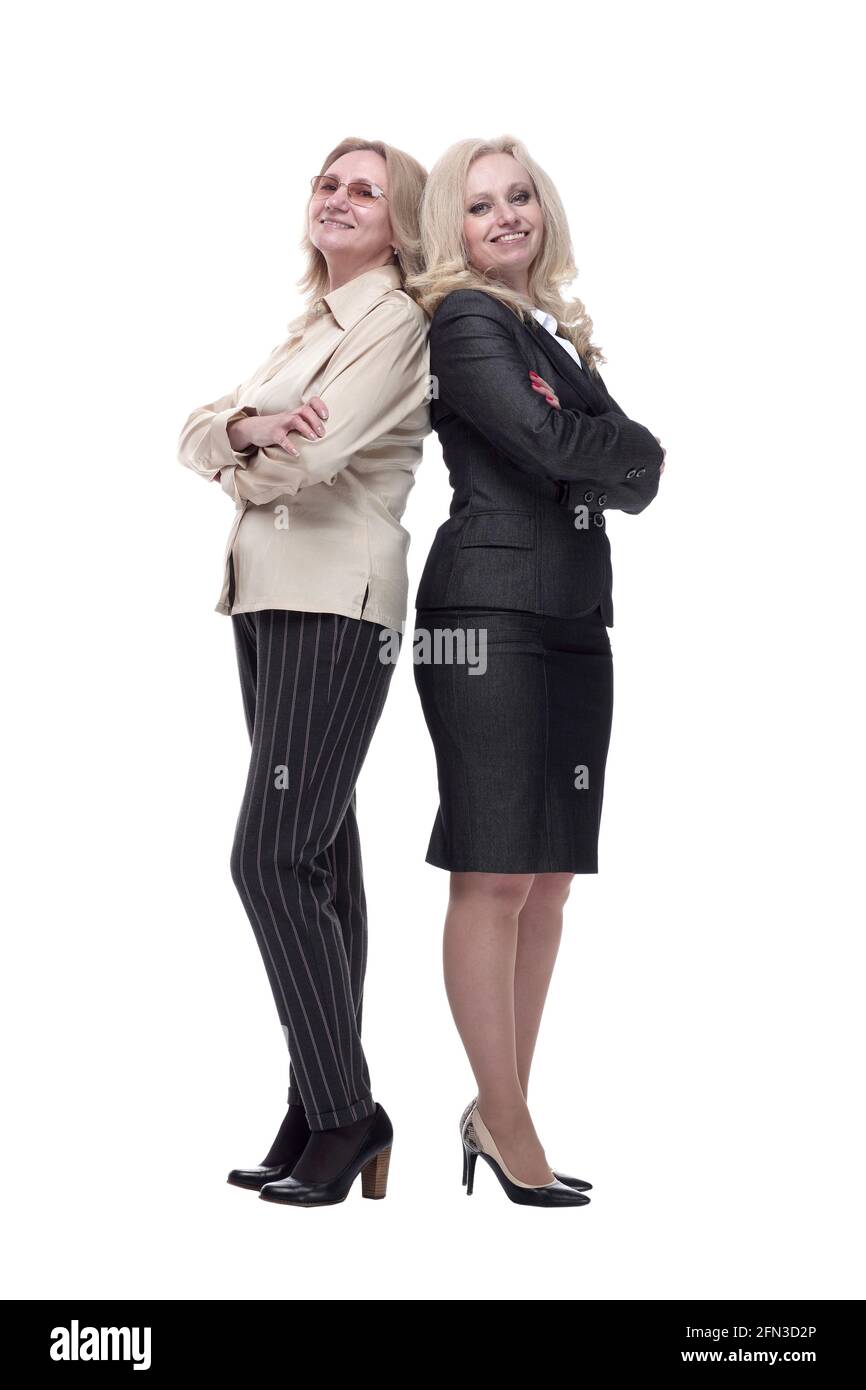 two different smiling women standing together. isolated on a white ...