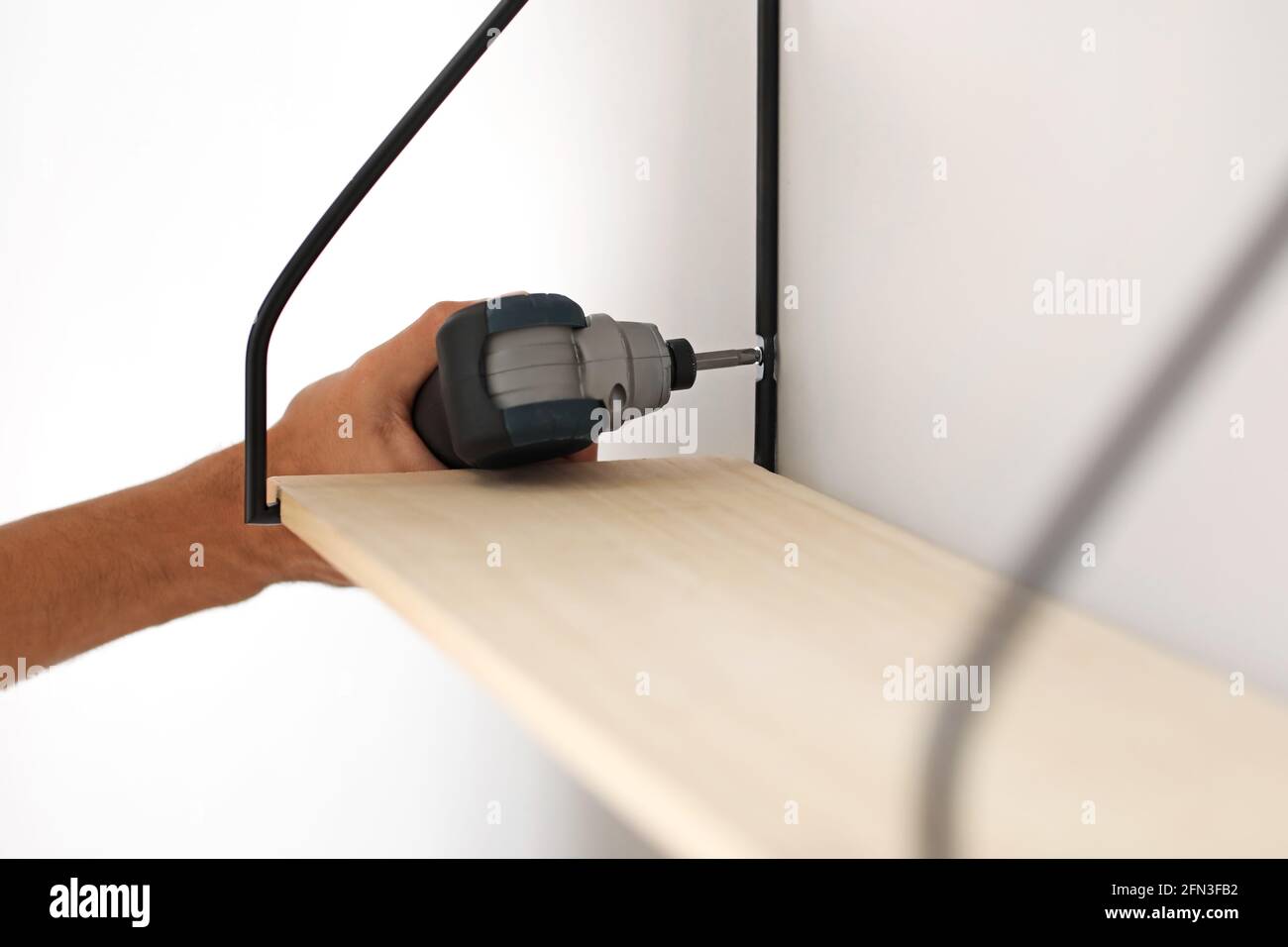 Installing shelves hi-res stock photography and images - Alamy