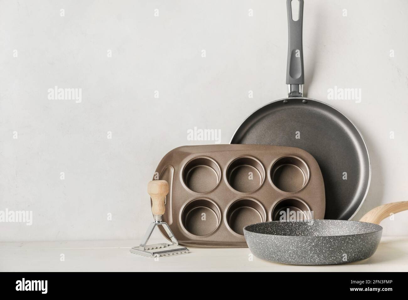 Set of kitchen utensils on white background Stock Photo - Alamy