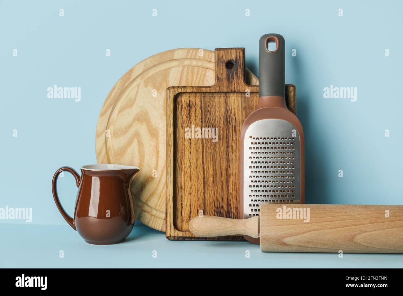 Set of kitchen utensils on color background Stock Photo - Alamy