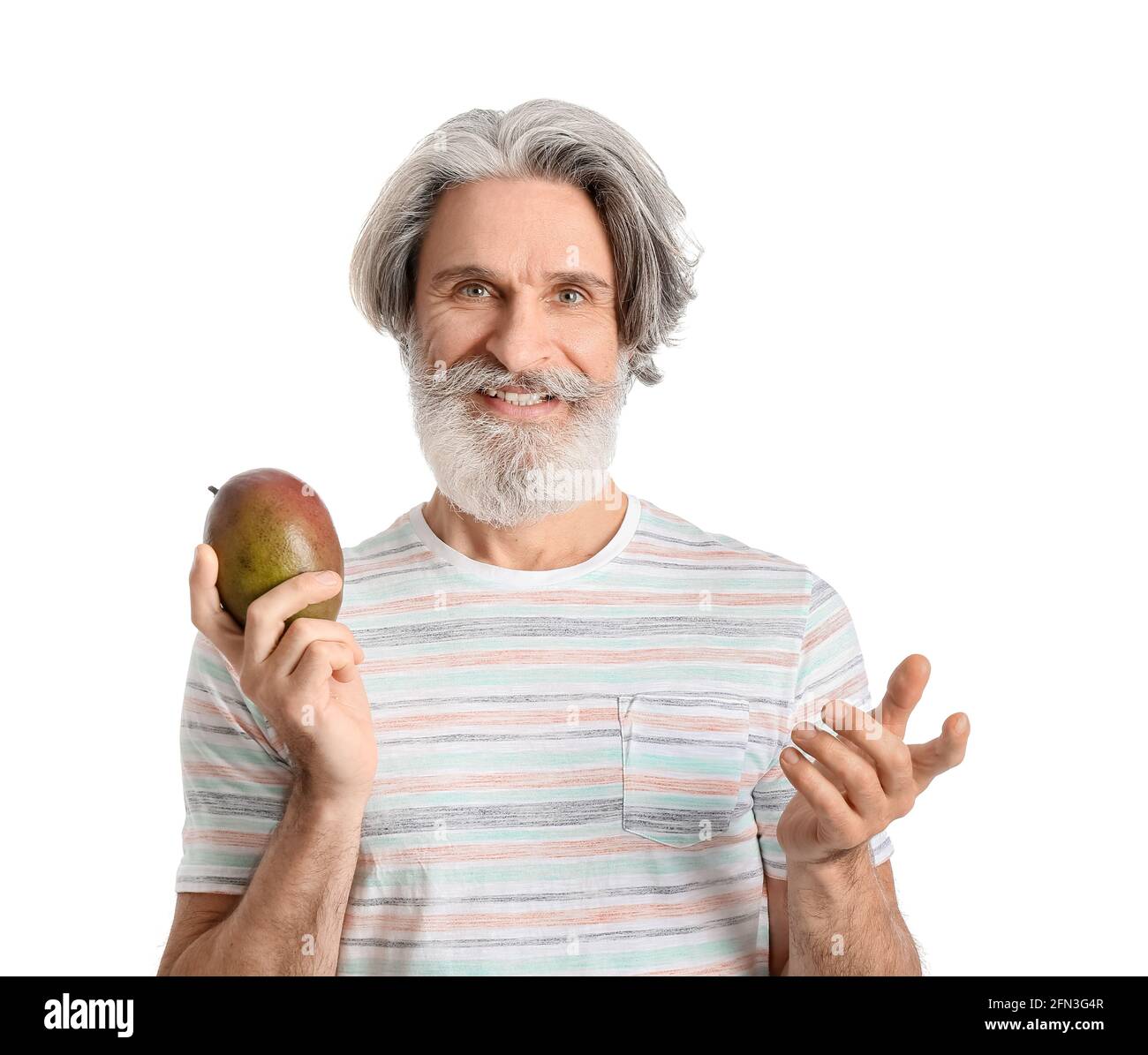Senior man with fresh mango on white background Stock Photo - Alamy