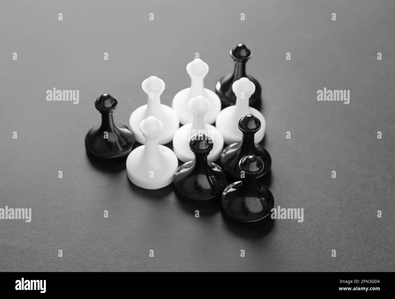 Chess pieces on grey background Stock Photo - Alamy