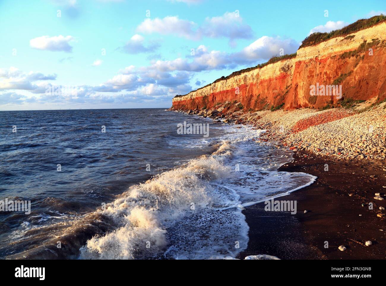 Hunstanton Cliffs, striped pattern, waves, high tide, surf, The Wash ...