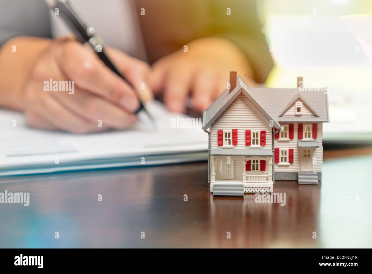 Signing docs hi-res stock photography and images - Alamy