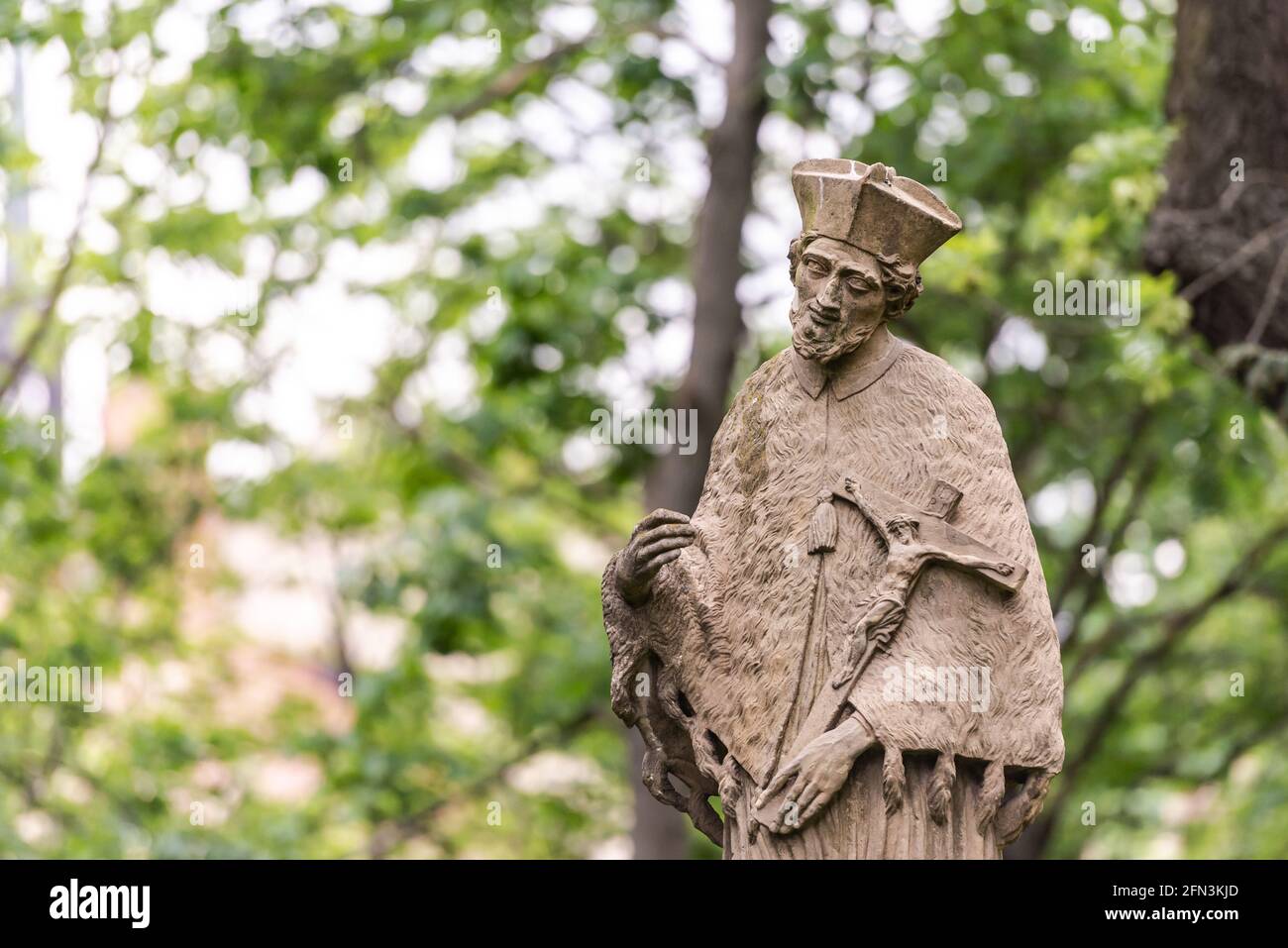 Monument in the garden of Brno Castle. Stone monument to a man on the ...