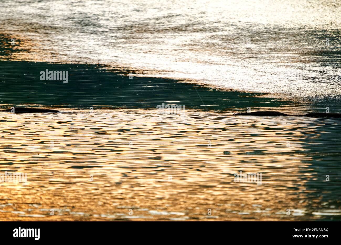 Symmetrical Shapes reflections and sunset Stock Photo - Alamy