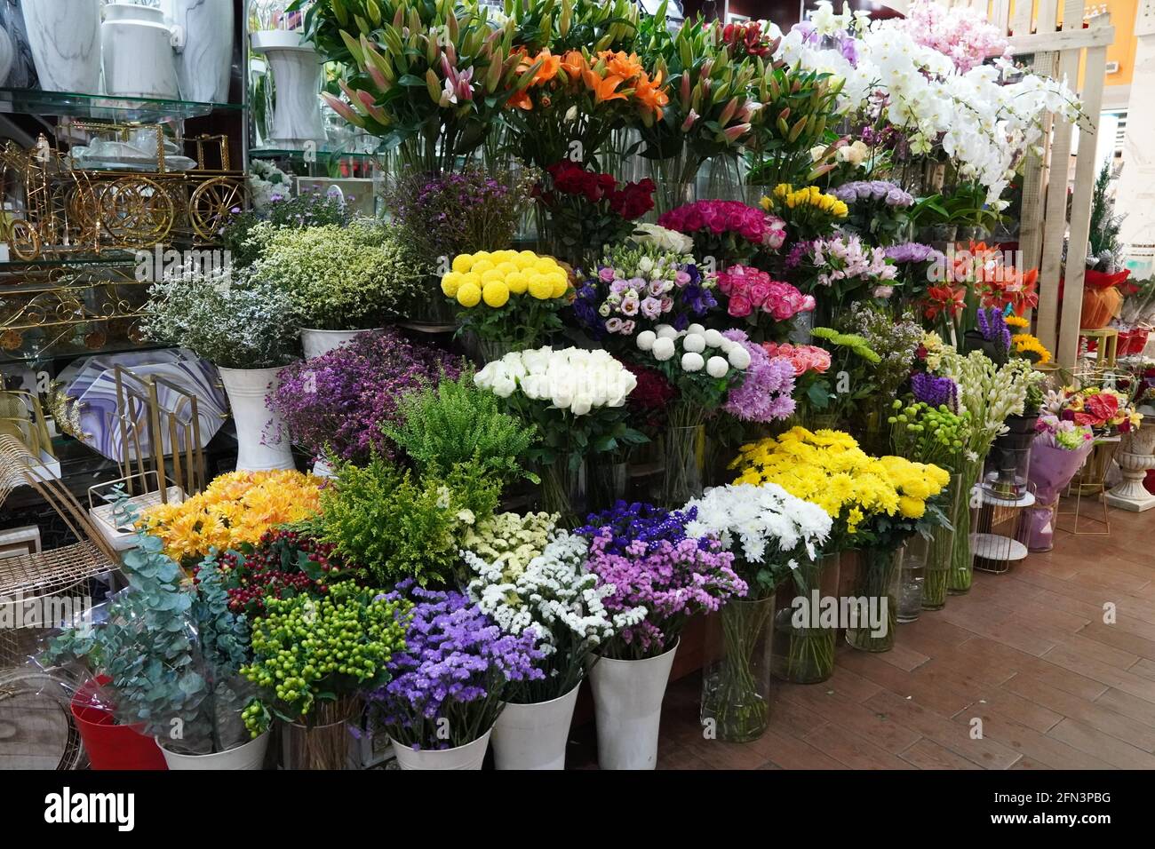Bouquet of colorful roses and other different flowers at the entry to ...