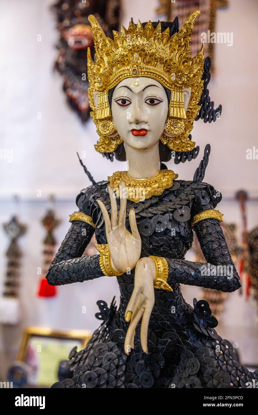 Statue of Balinese traditional dancer made of hollowed coins (kepeng ... Statue of Balinese traditional dancer made of hollowed coins (kepeng ...