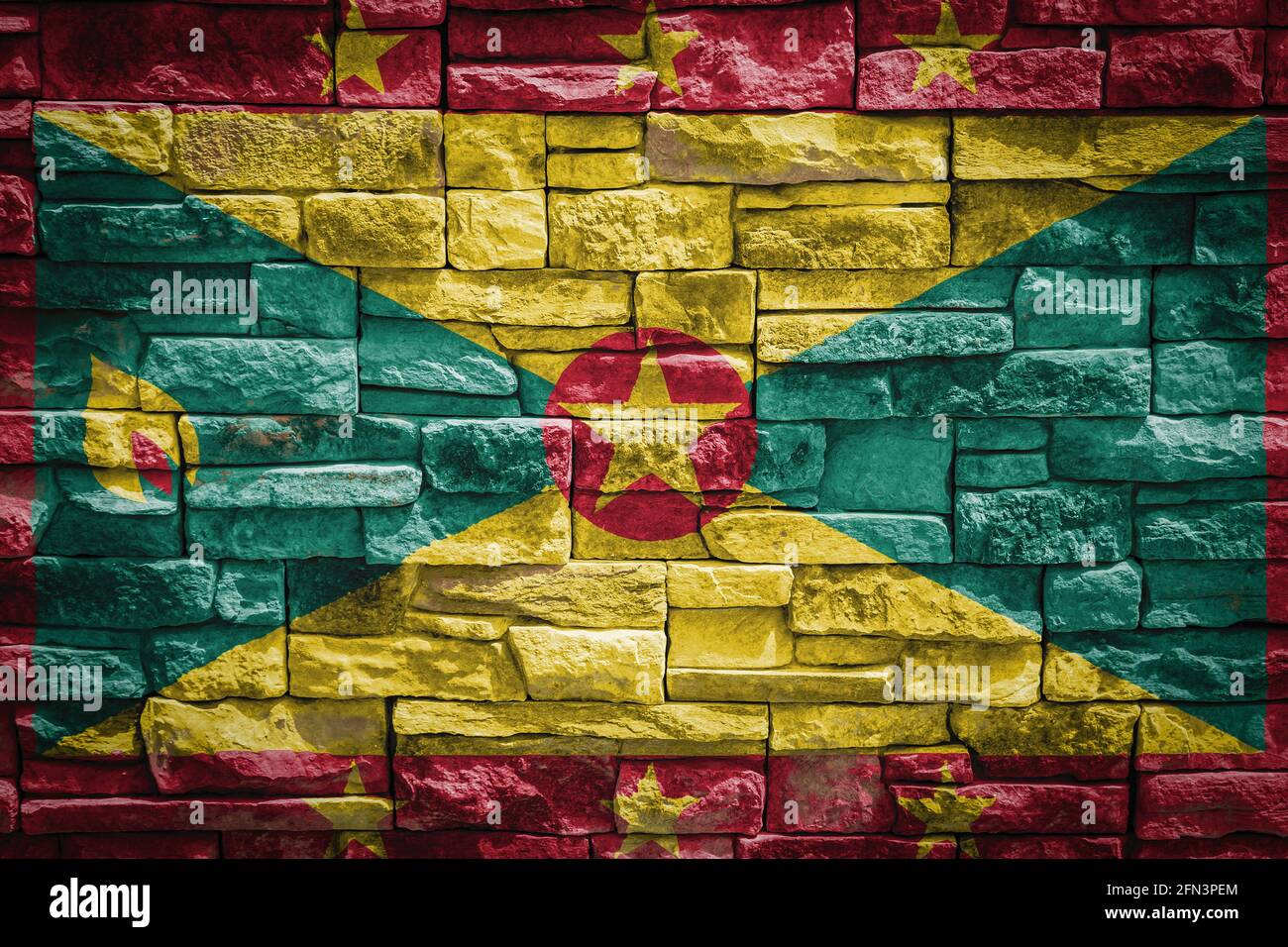 National flag of Grenada on stone wall background.The concept of ...