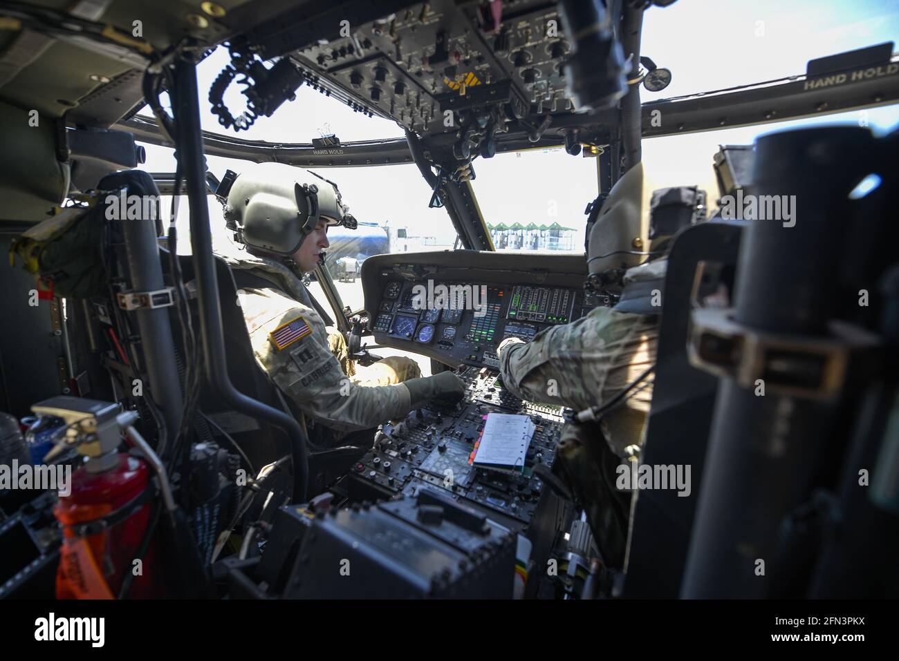 Members of the US air force 228th aviation regiment prepare to take off ...