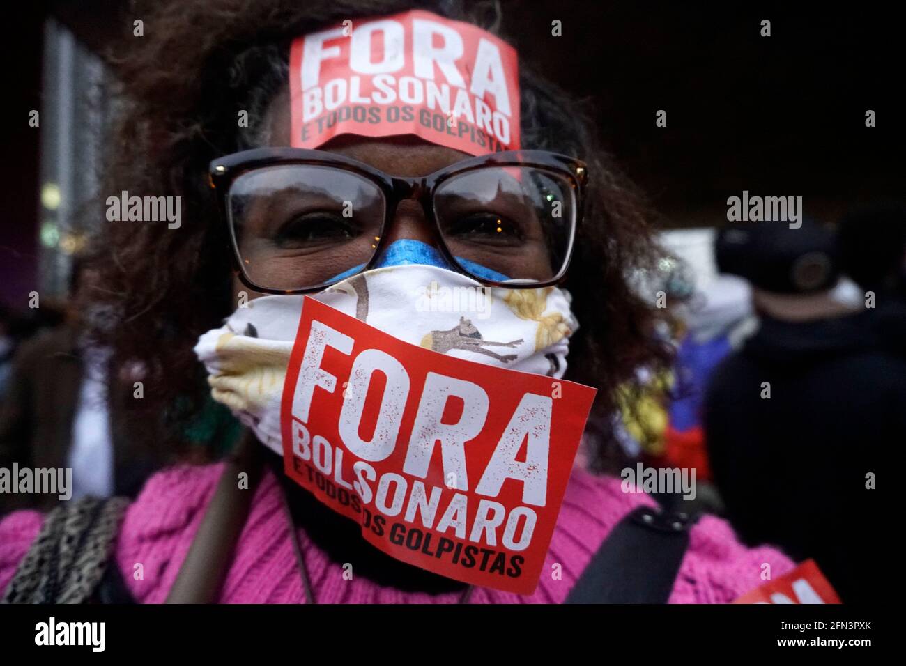 Sao Paulo, Brazil. 13th May, 2021. People take part in a protest during ...