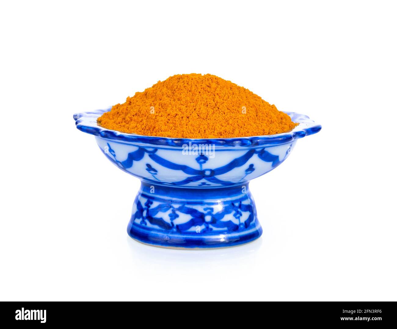 turmeric isolated on white background Stock Photo - Alamy