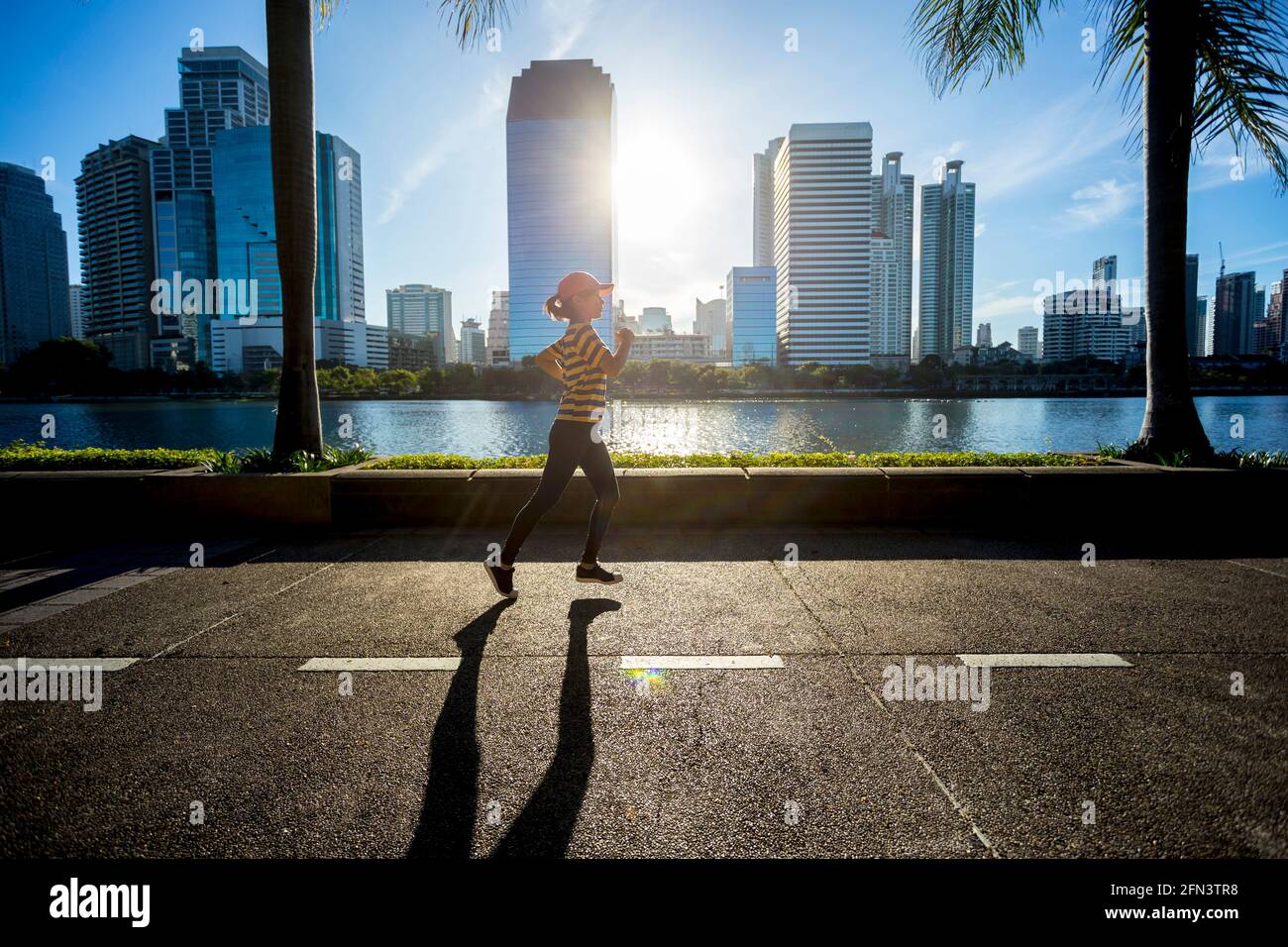 Running in city hi-res stock photography and images - Alamy