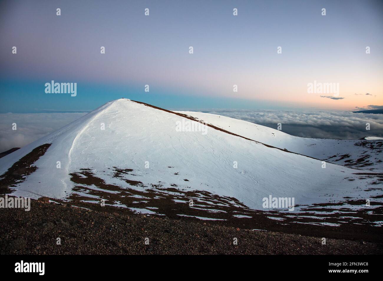 The summit of Mauna Kea, the largest shield volcano in the world, and ...
