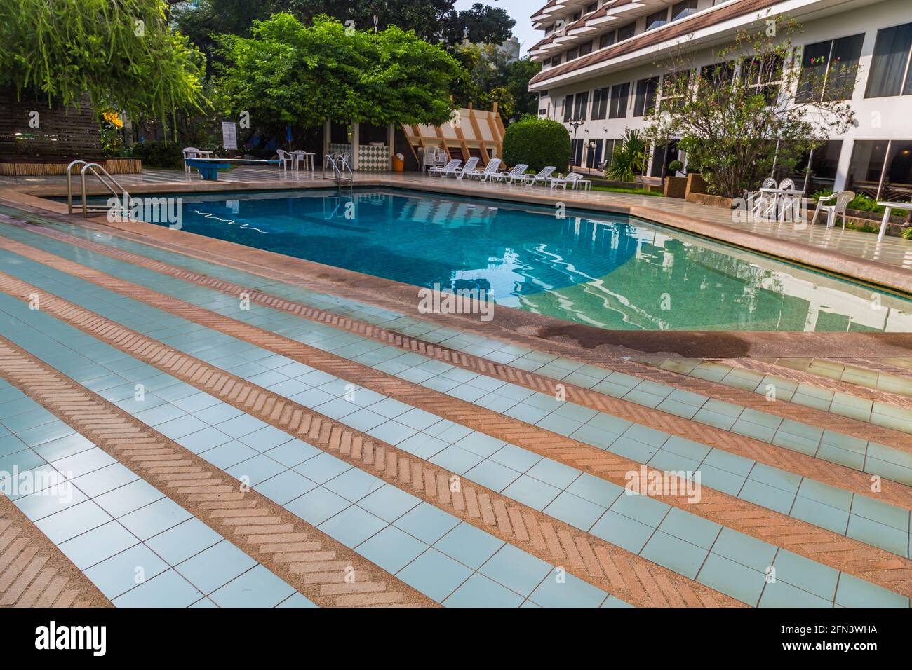 Swimming pool at hotel background Stock Photo - Alamy