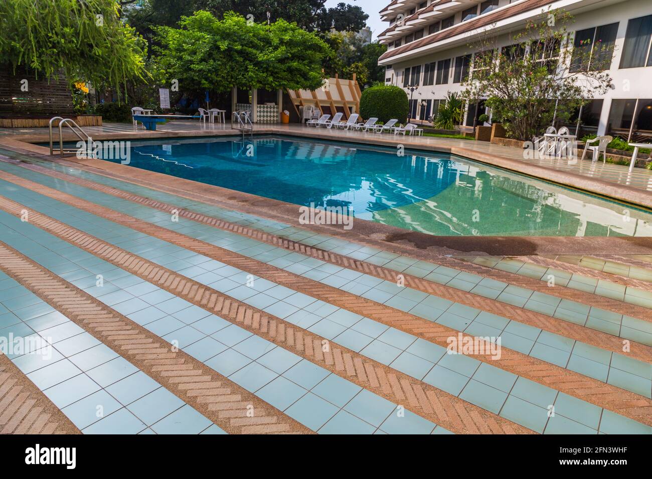 Swimming pool at hotel background Stock Photo - Alamy