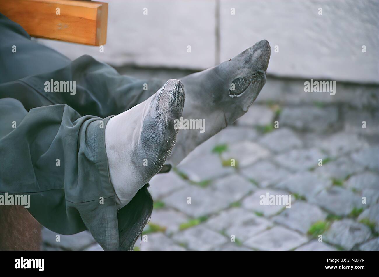View of legs of a homeless man, in Istanbul, Turkey Stock Photo - Alamy