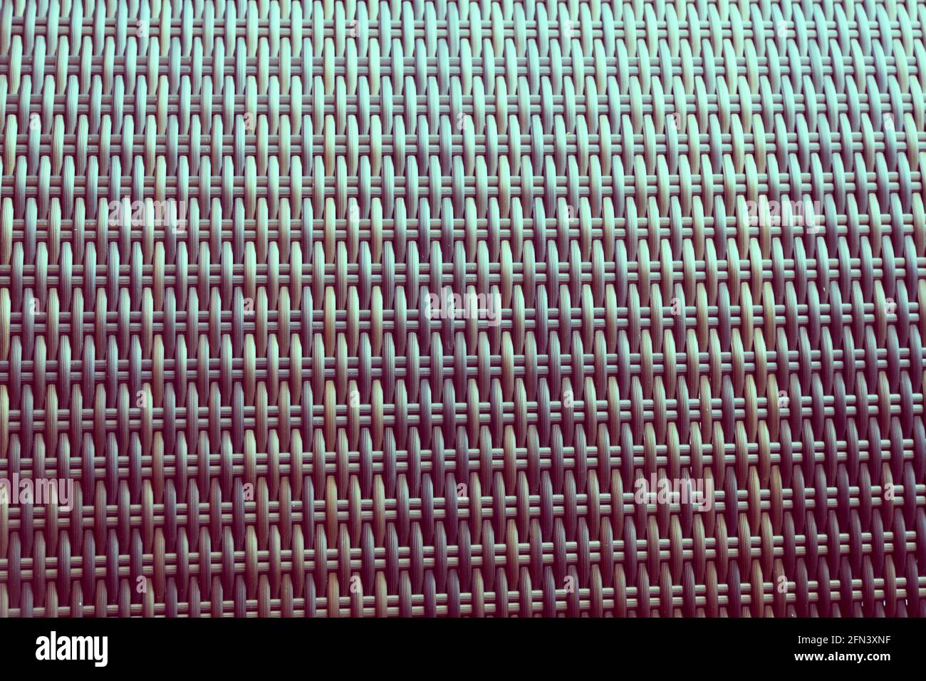 Synthetic rattan texture weaving background as used on outdoor garden ...