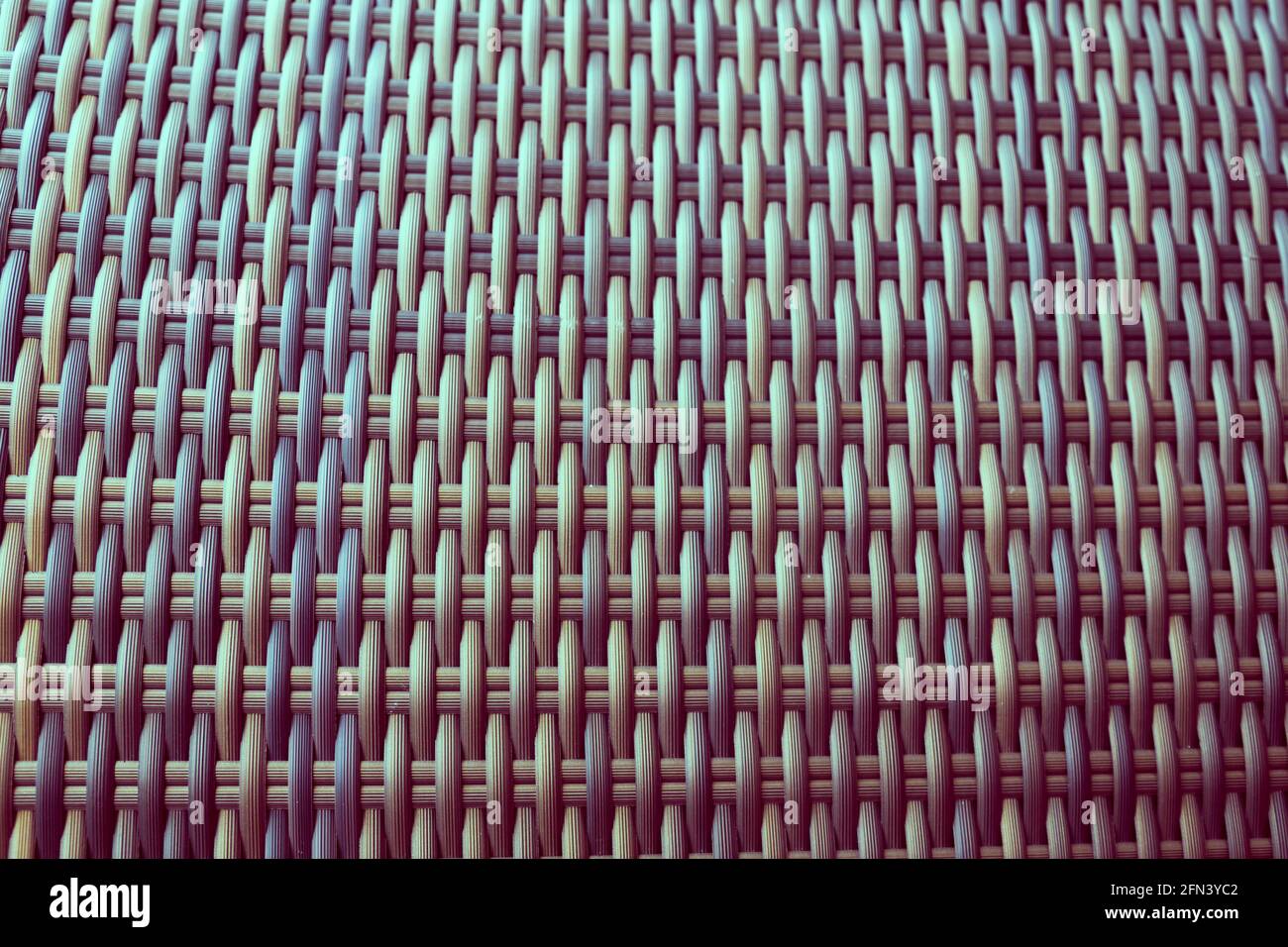 Synthetic rattan texture weaving background as used on outdoor garden ...