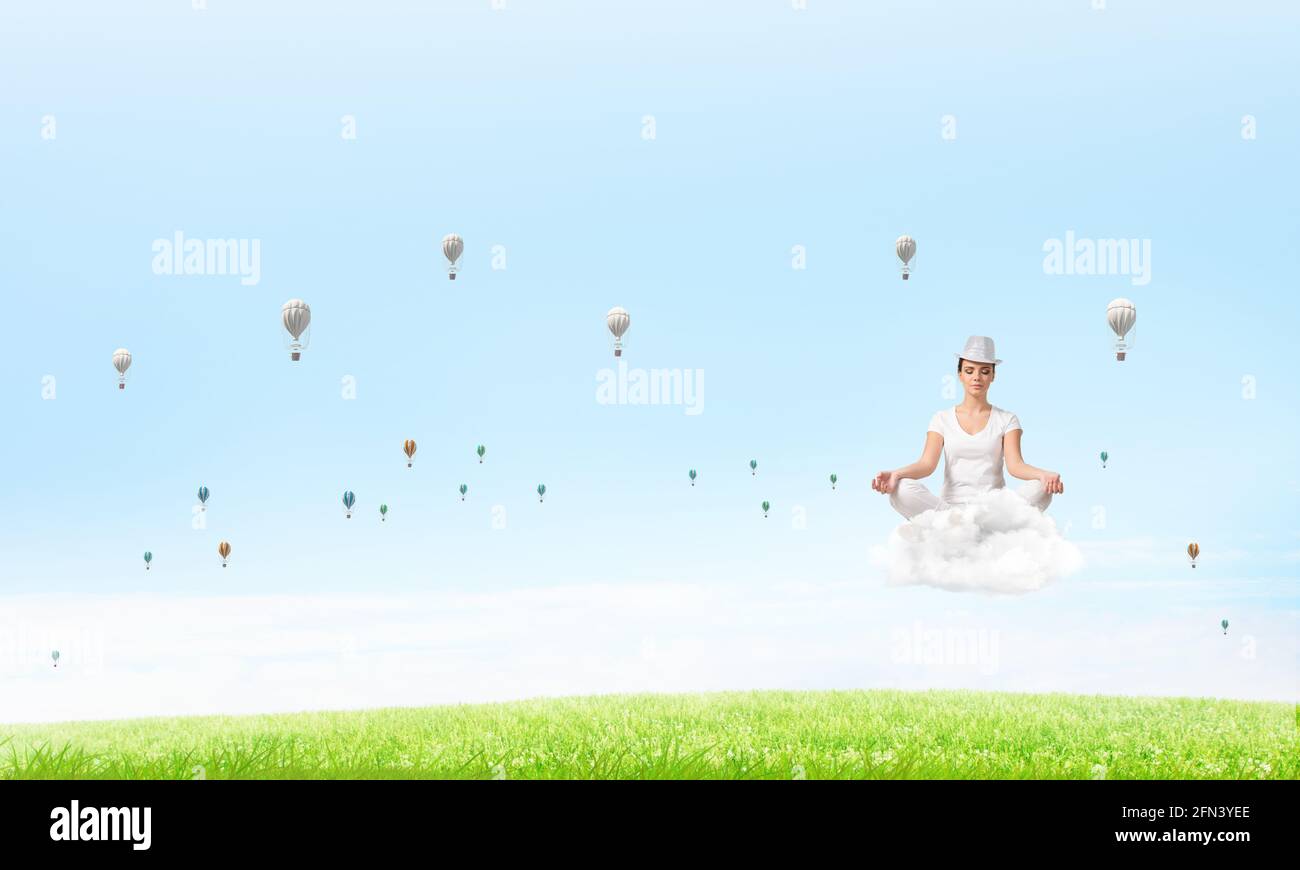 Young woman keeping mind conscious Stock Photo - Alamy