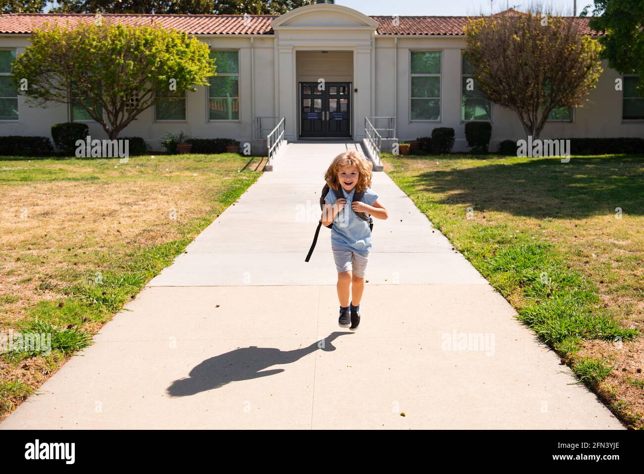 Students Running Out School High Resolution Stock Photography and ...
