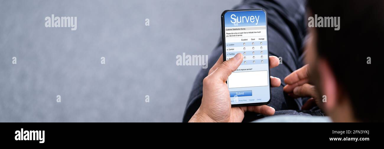 Online Survey Questionnaire Poll Form On Computer Stock Photo - Alamy