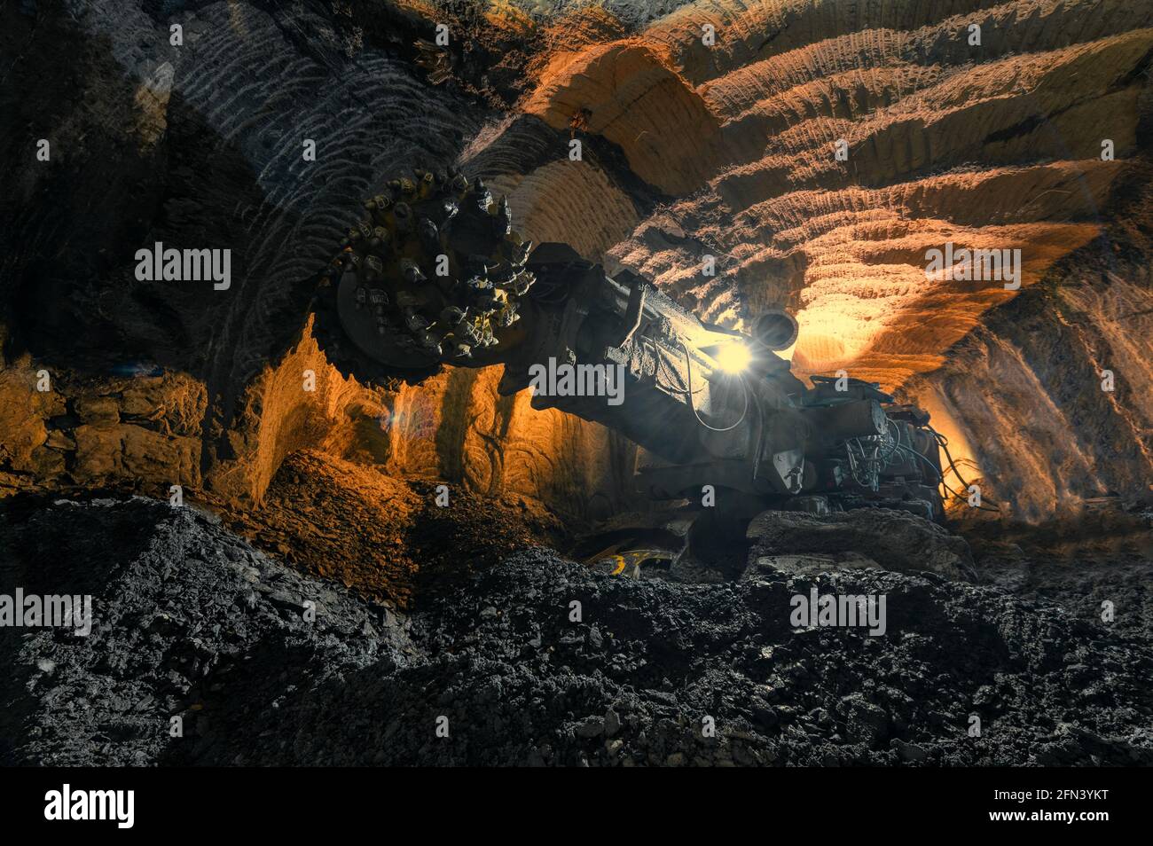Drilling head of a mine roadheader. Underground mining of ore deposits ...