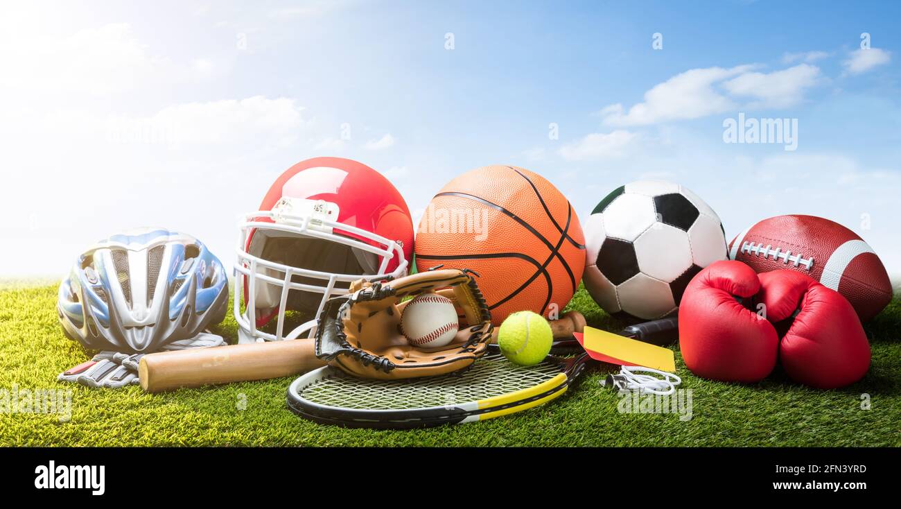 Various Sport Equipment And Balls On Grass Stock Photo - Alamy